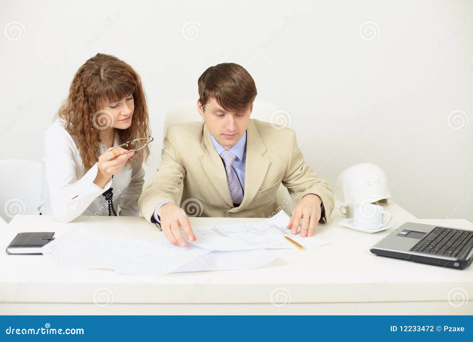 Young Engineers Plan Work Sitting at a Table Stock Photo - Image of ...