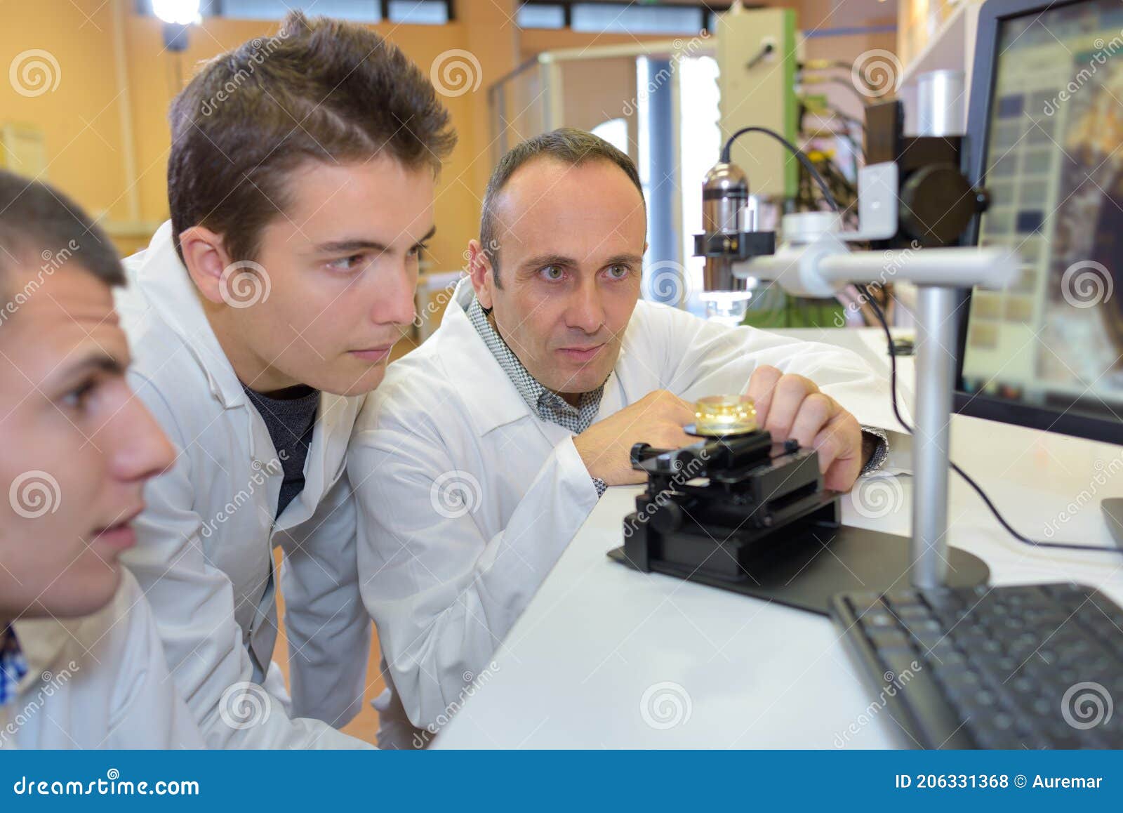 Young Engineers Testing Invention Stock Photo - Image of young ...