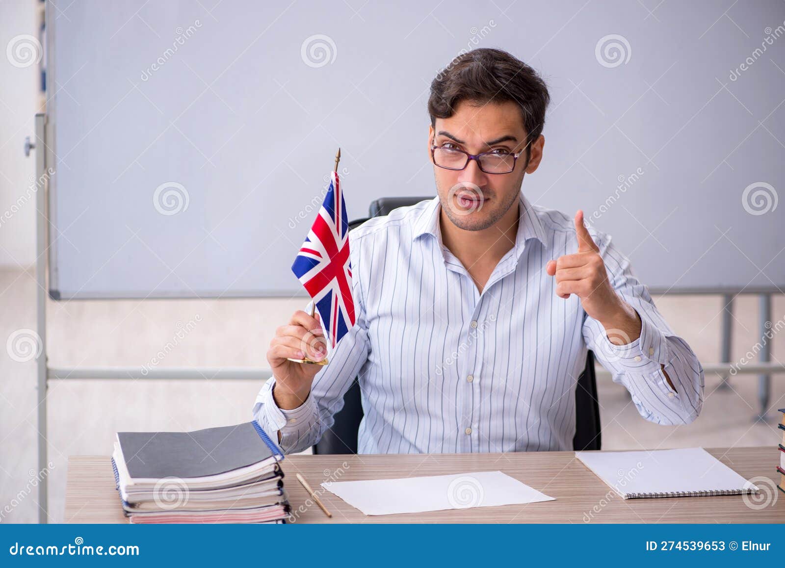 Young Male English Language Teacher in the Classroom Stock Image ...