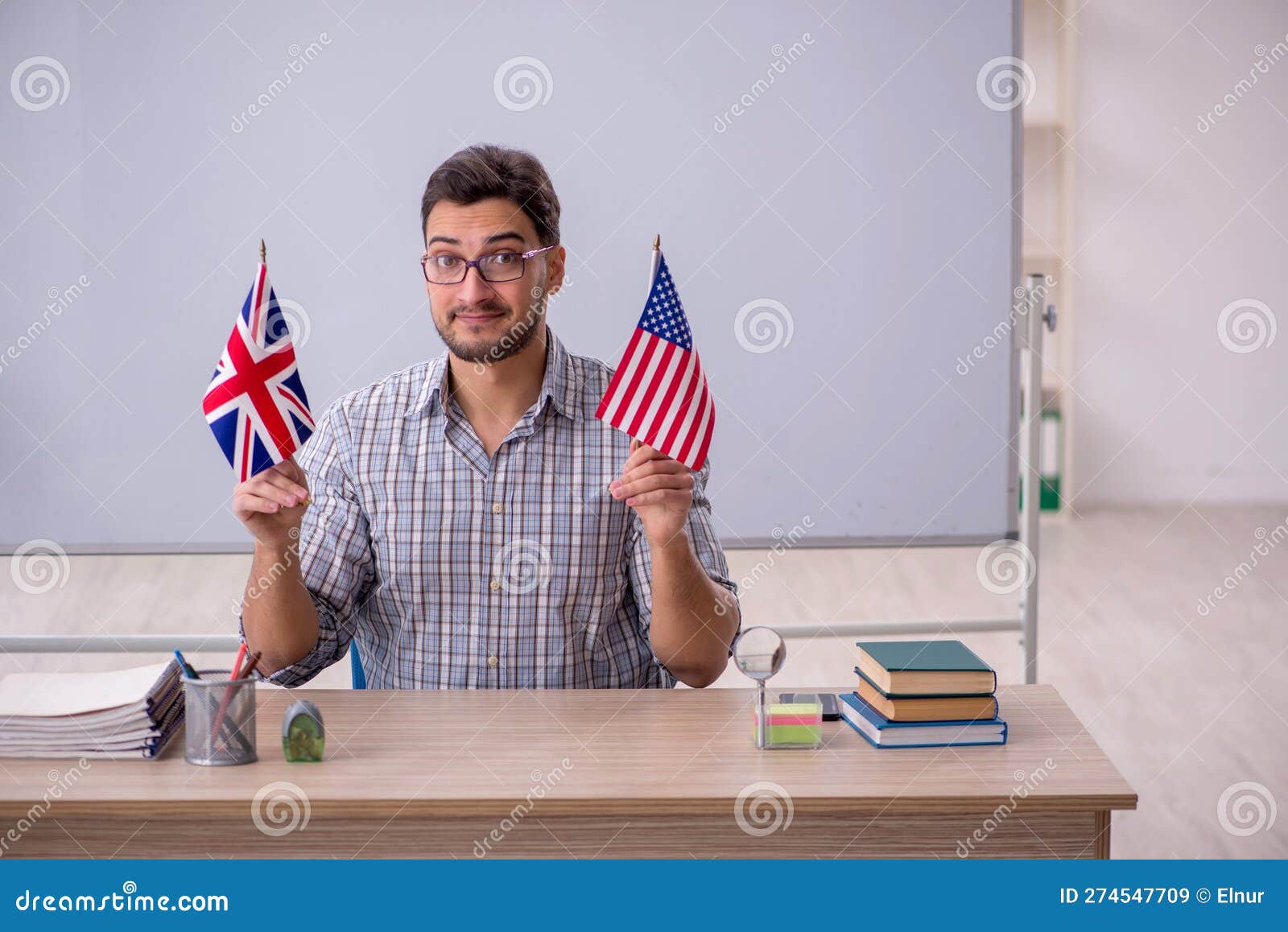 Young Male English Language Teacher in the Classroom Stock Image ...