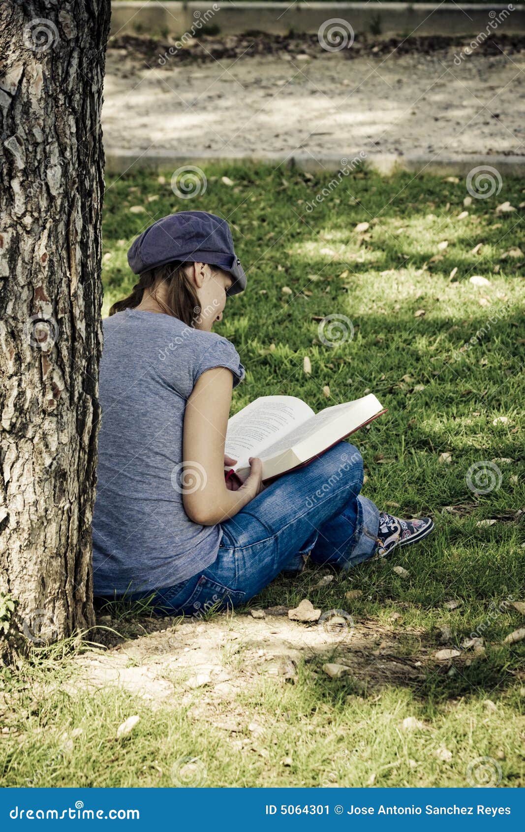 Young enjoying a book stock image. Image of read, outdoors - 5064301
