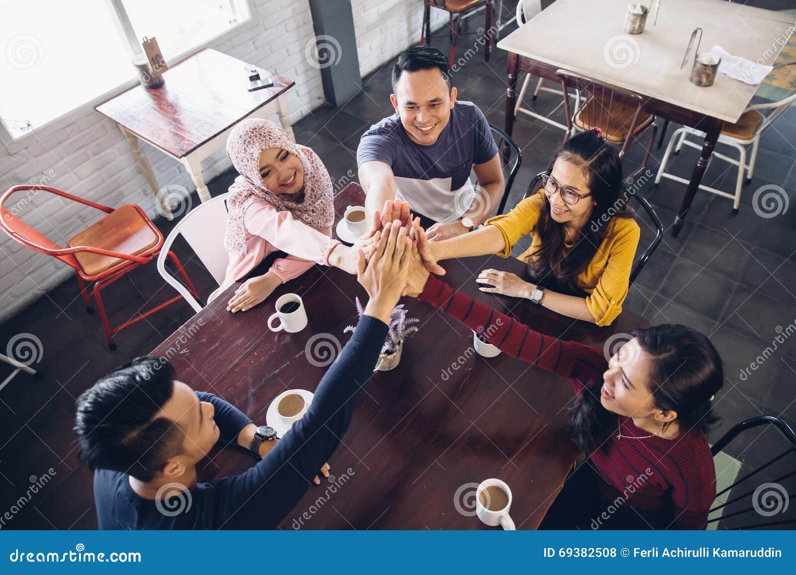 Young Enthusiastic Team Giving High Five Stock Photo - Image of gesture ...