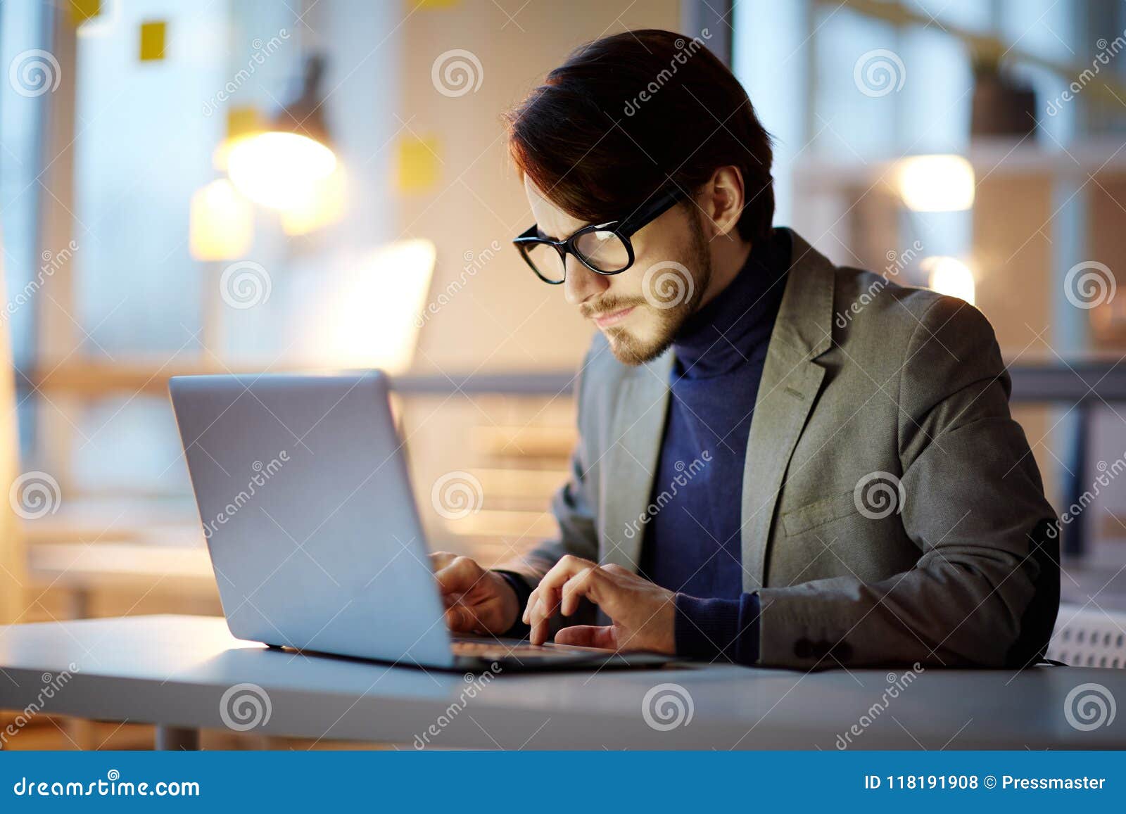 Young Entrepreneur Focused on Work Stock Photo - Image of indoors ...