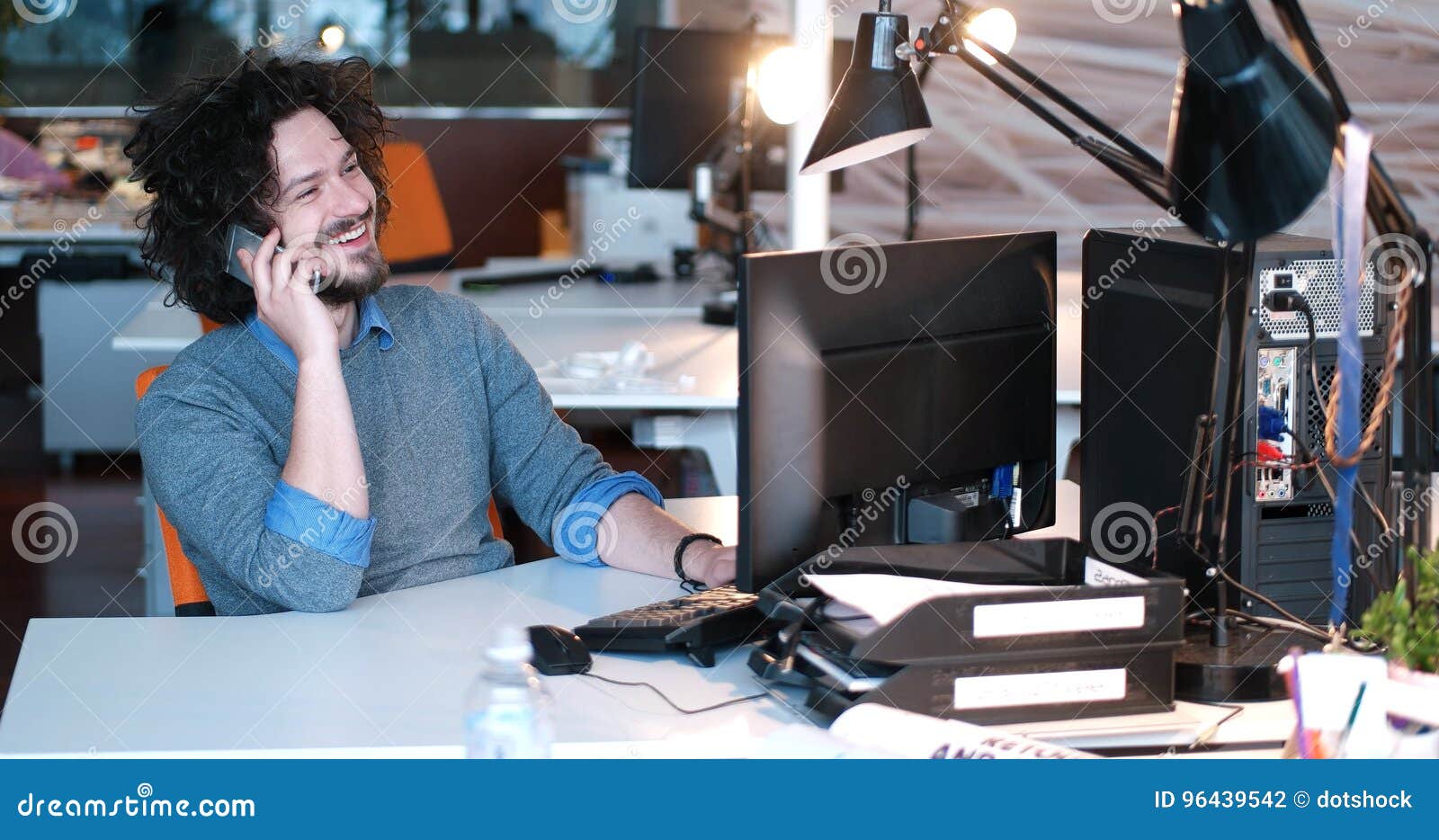 Businessman Working Using a Computer in Startup Office Stock Photo ...