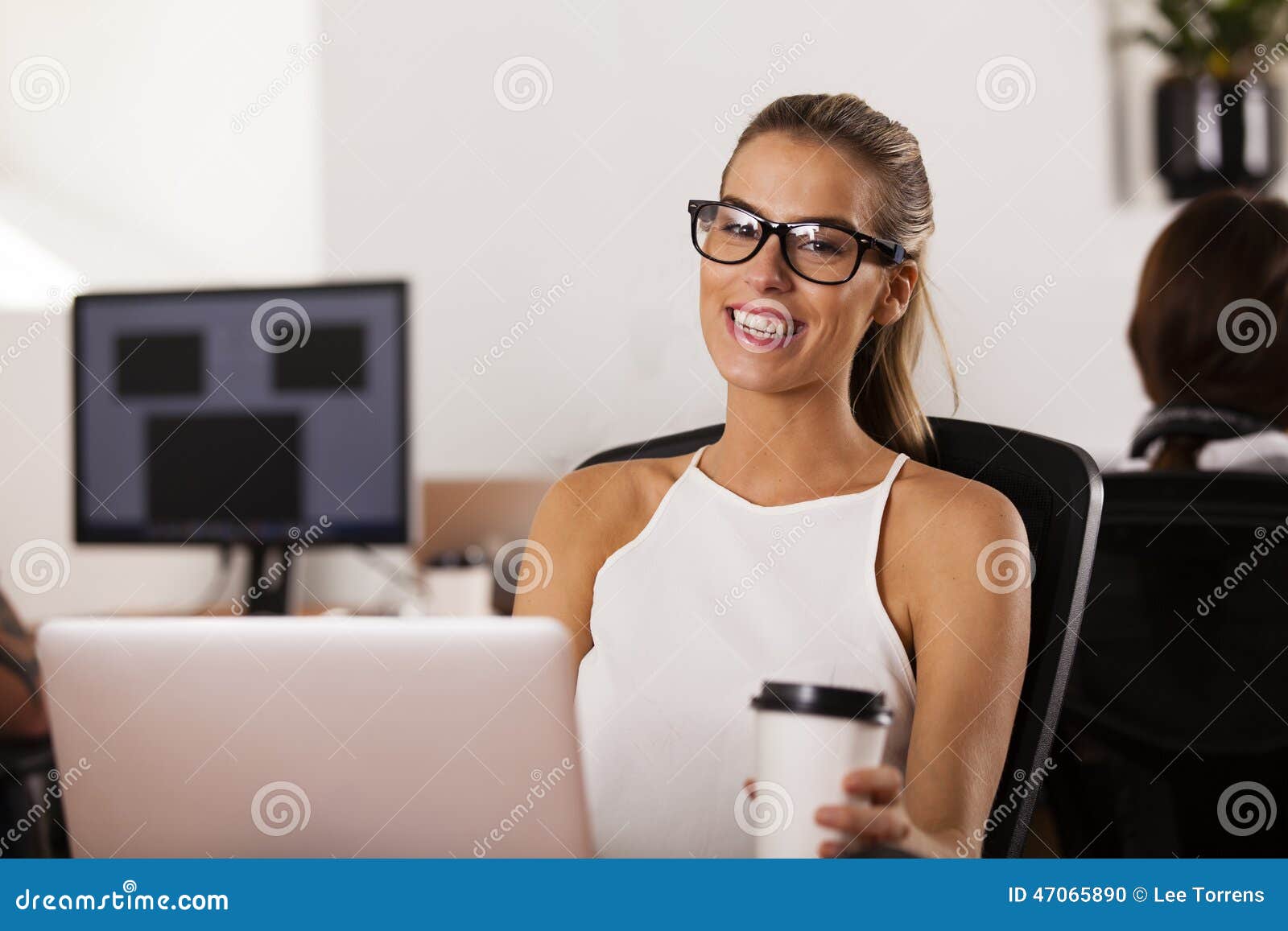 Young Entrepreneur Smiling in Her Startup Office Stock Photo - Image of ...