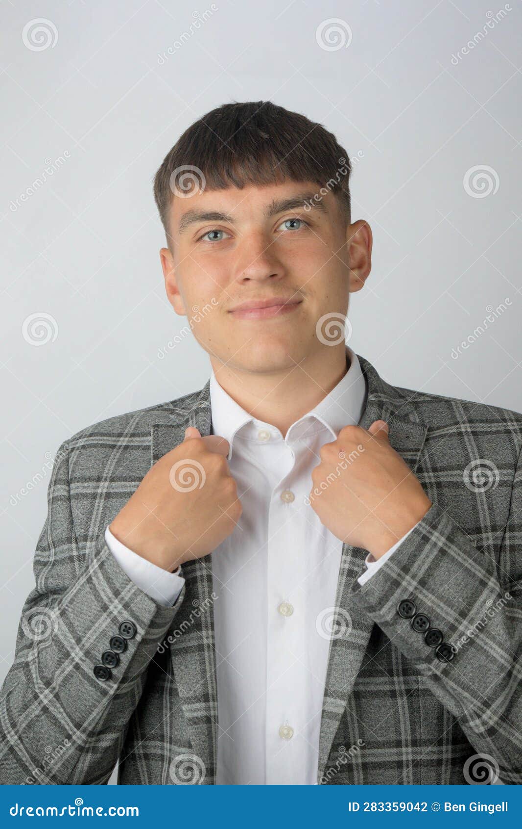 Young Entrepreneur Wearing a Suit Jacket and Open Neck Shirt Stock ...