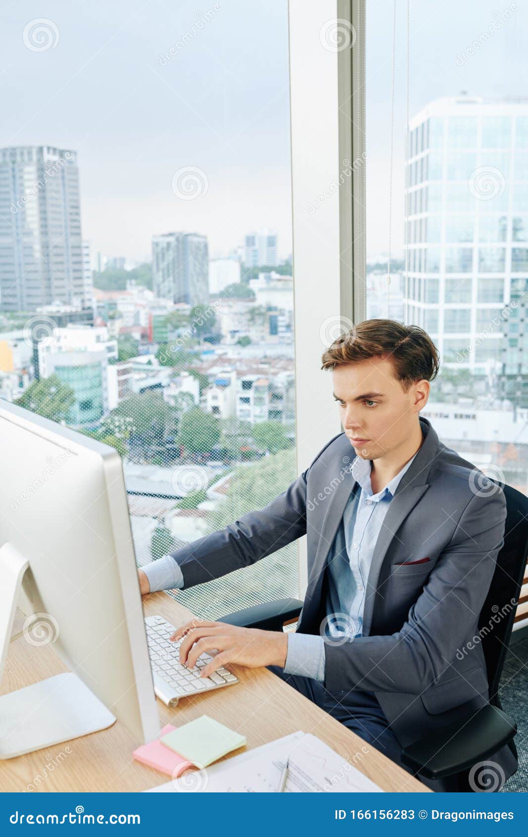 Young Entrepreneur Working on Computer Stock Image - Image of ...