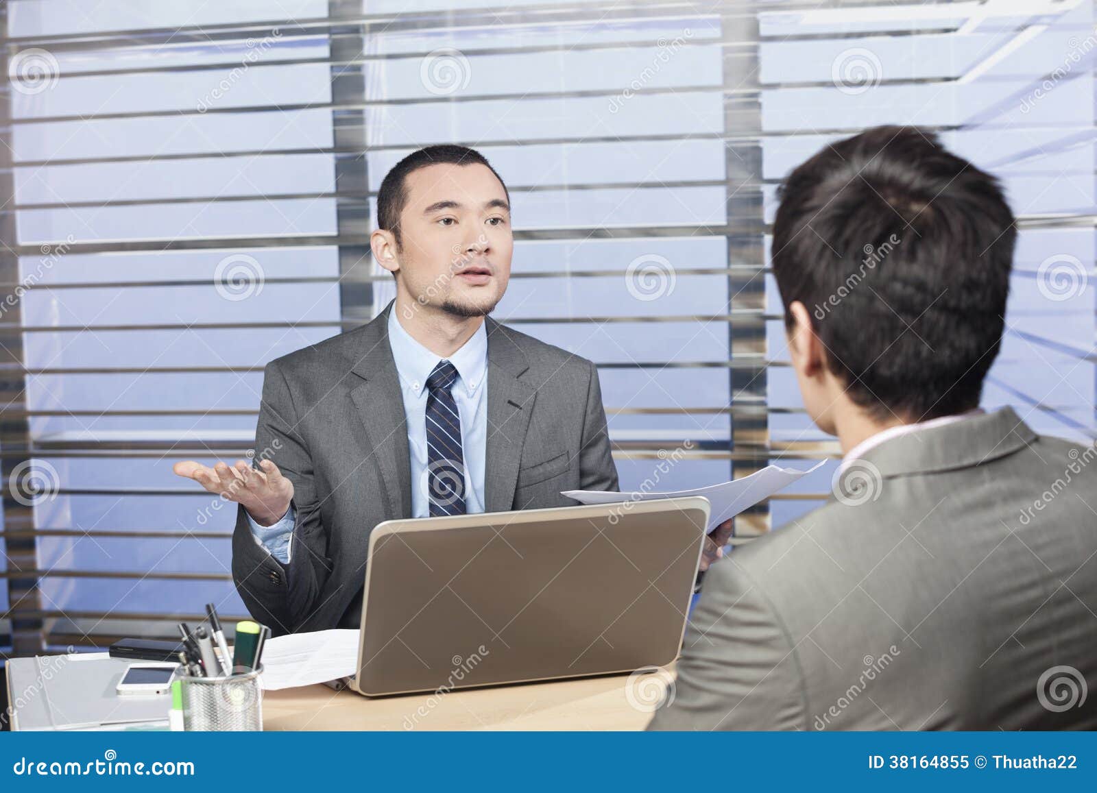 Young Executive Demanding Explanation from His Employee Stock Image ...