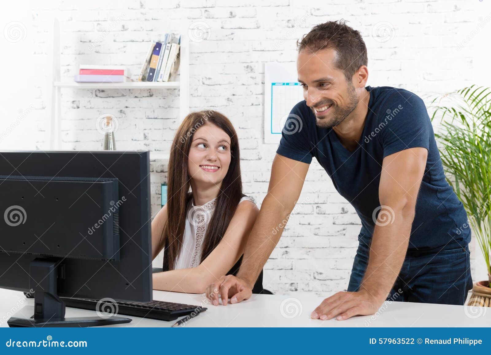 A Young Executive Man and His Secretary Stock Photo - Image of ...