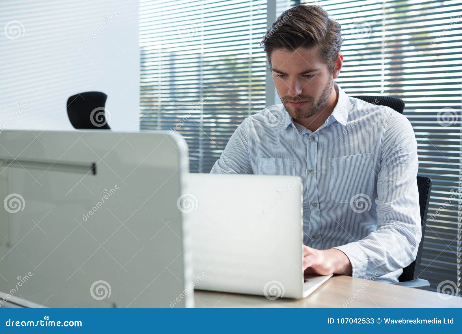 Young Executive Man Using His Laptop Stock Image - Image of browsing ...