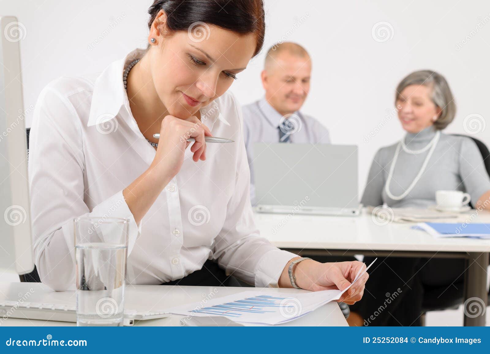 Young Executive Woman Review Charts Stock Photo - Image of boss ...