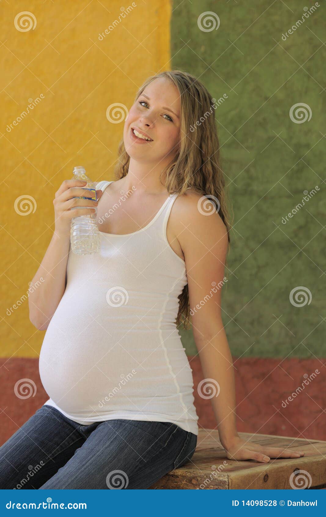 Young Expecting Mother in Garden Stock Photo - Image of smiling, family ...
