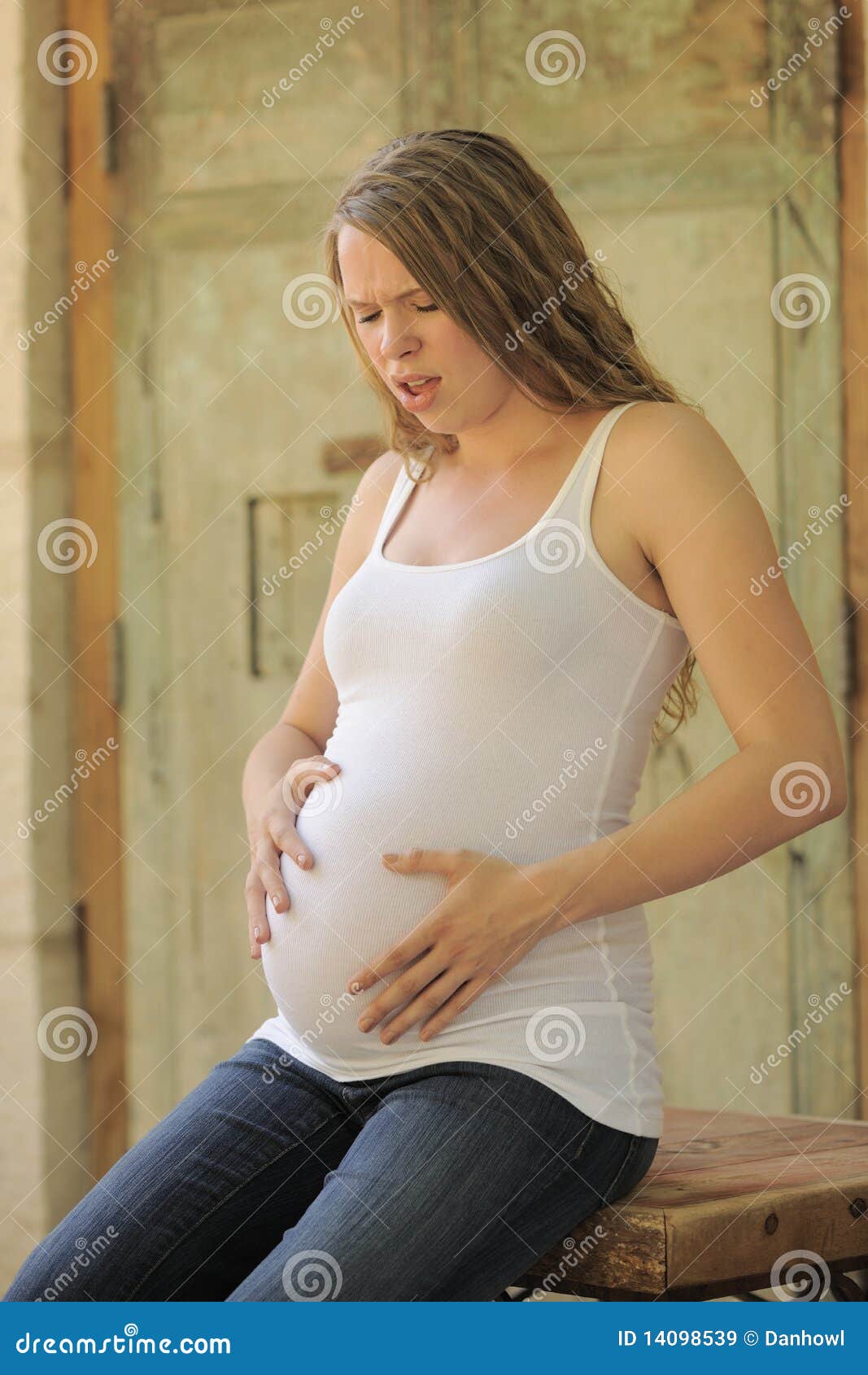 Young Expecting Mother in Garden Stock Image - Image of casual, beauty ...