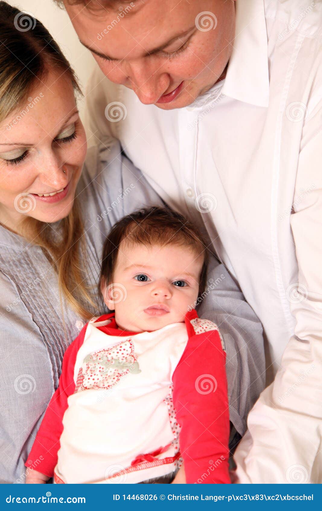 Young family with a baby. stock photo. Image of three - 14468026