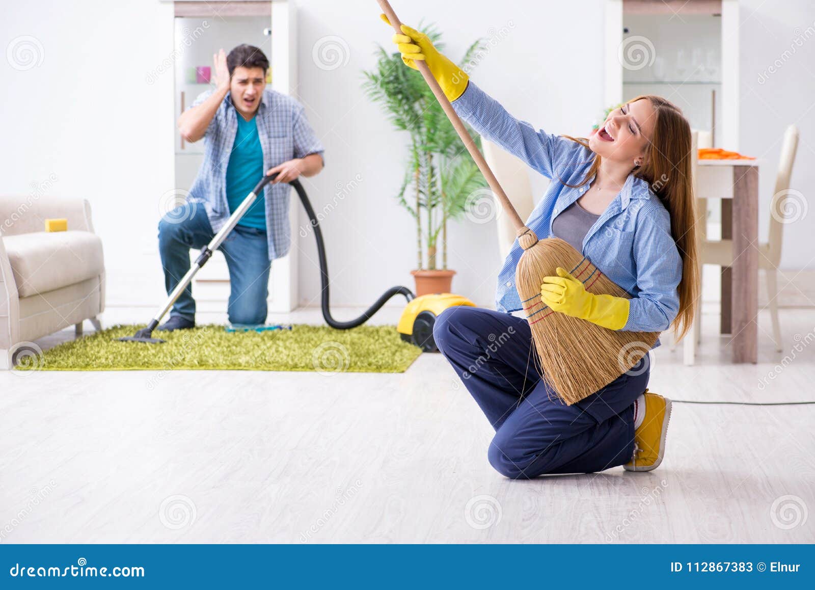 The Young Family Cleaning the House Stock Image - Image of husband ...
