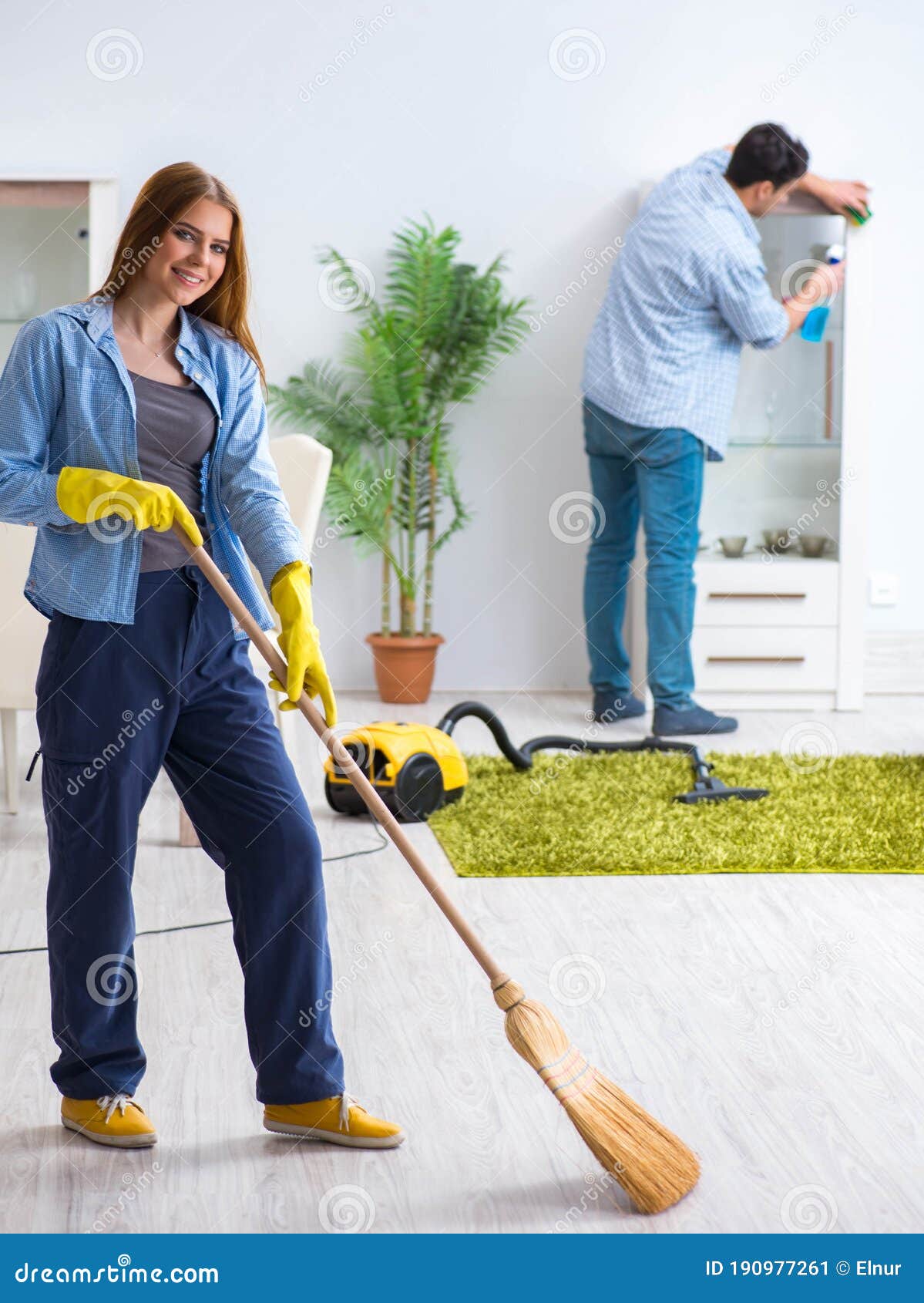 Young Family Cleaning the House Stock Image - Image of couple, clean ...