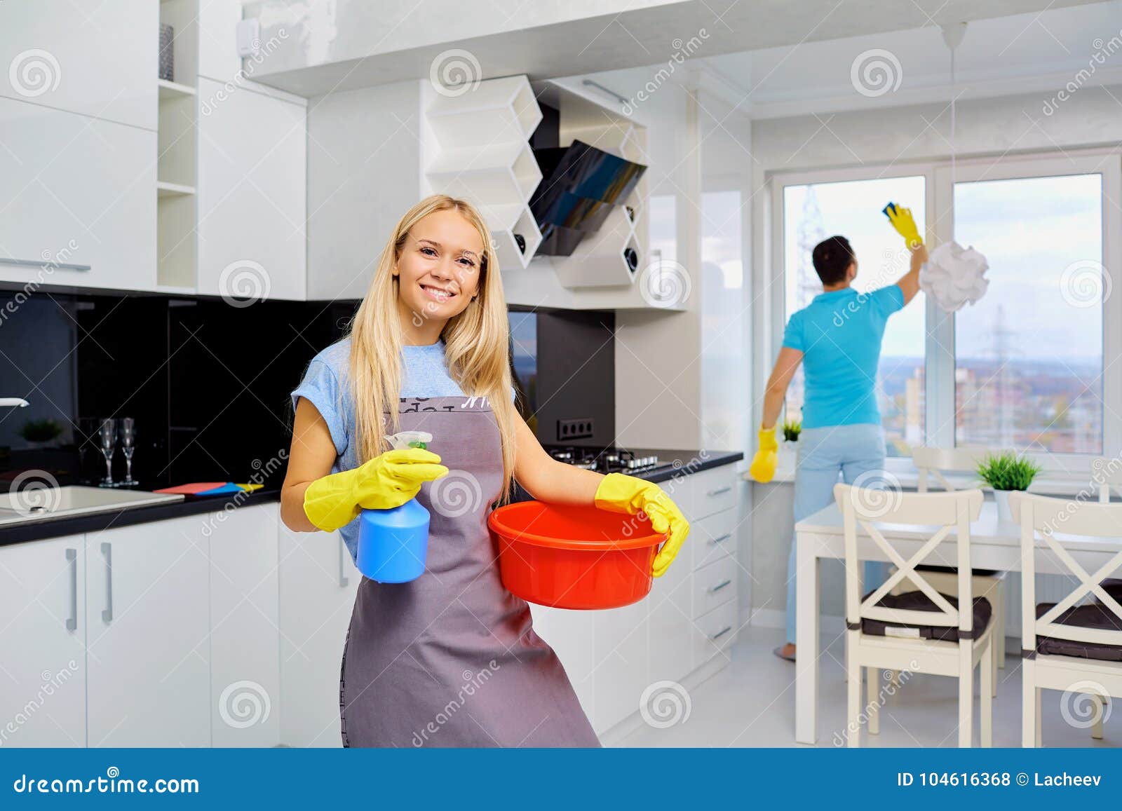 Young Family Couple Doing Cleaning in the Kitchen Stock Photo - Image ...