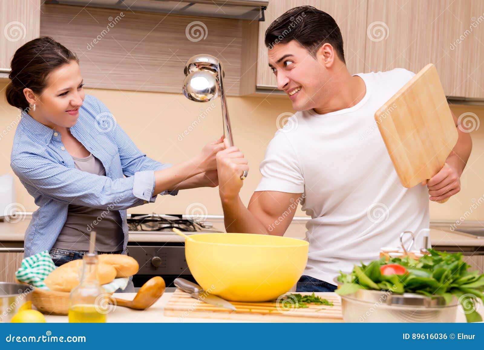 The Young Family Doing Funny Fight at Kitchen Stock Photo - Image of ...