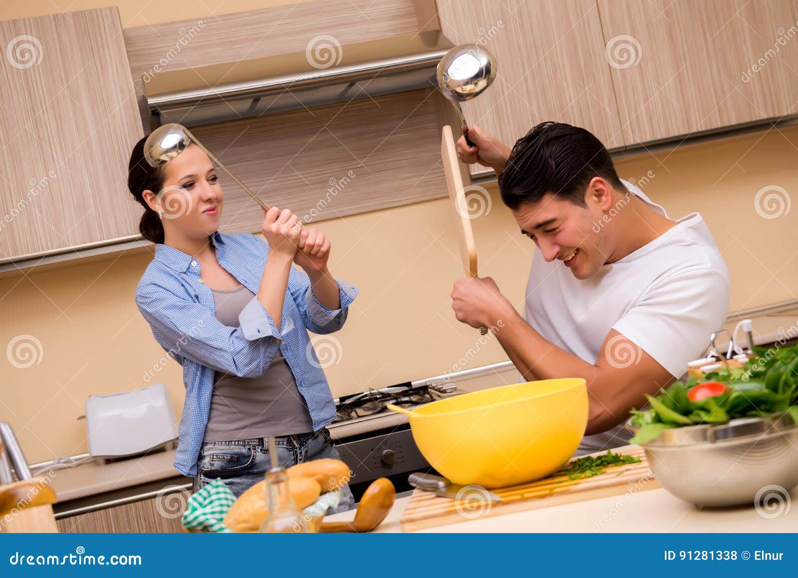 The Young Family Doing Funny Fight at Kitchen Stock Photo - Image of ...