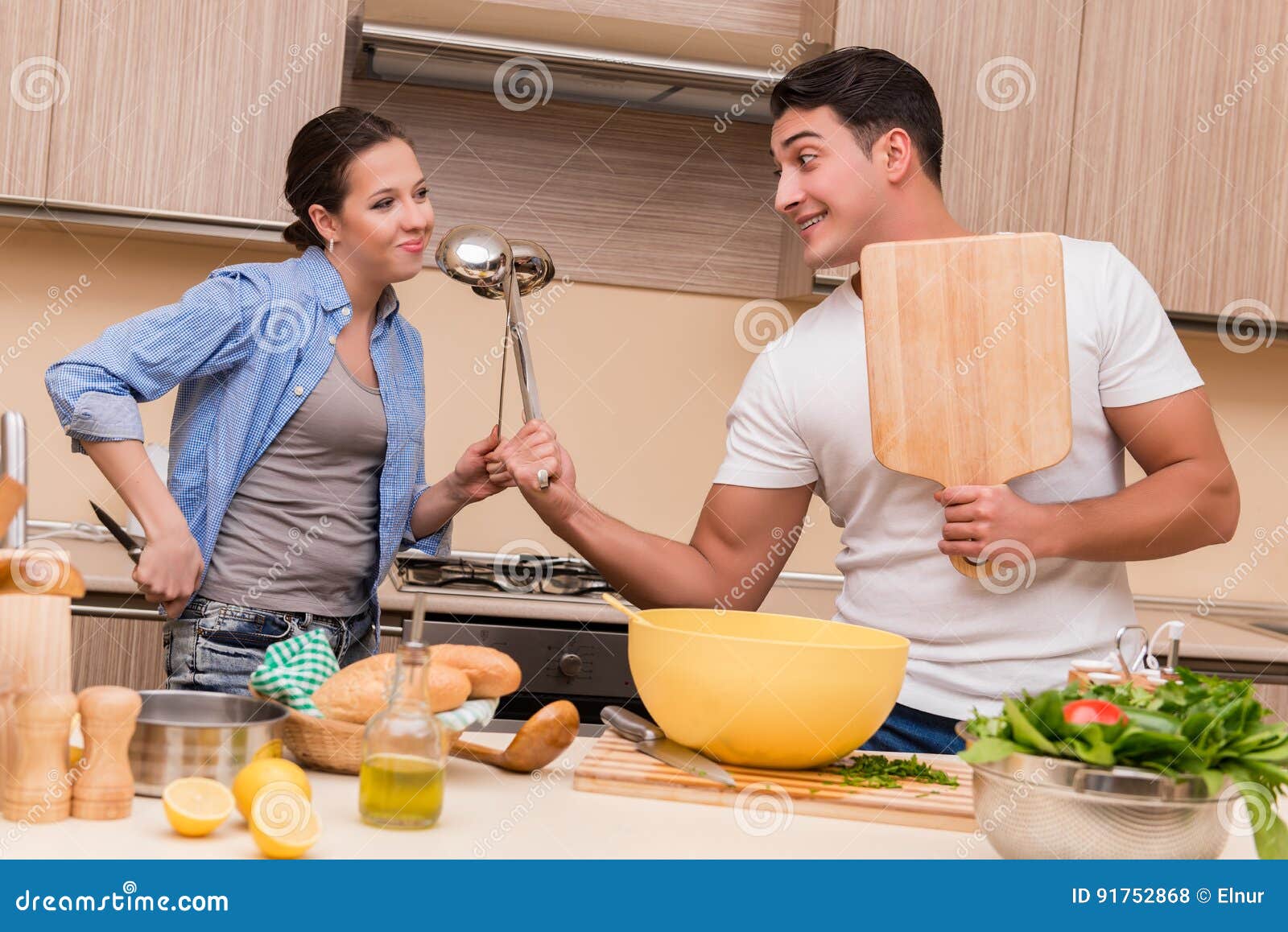 The Young Family Doing Funny Fight at Kitchen Stock Photo - Image of ...
