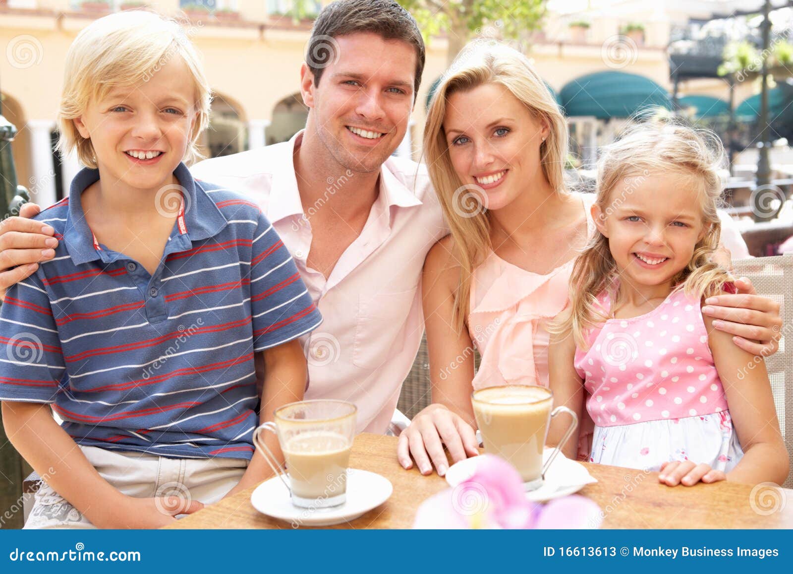 Young Family Enjoying Cup of Coffee Stock Image - Image of mother ...