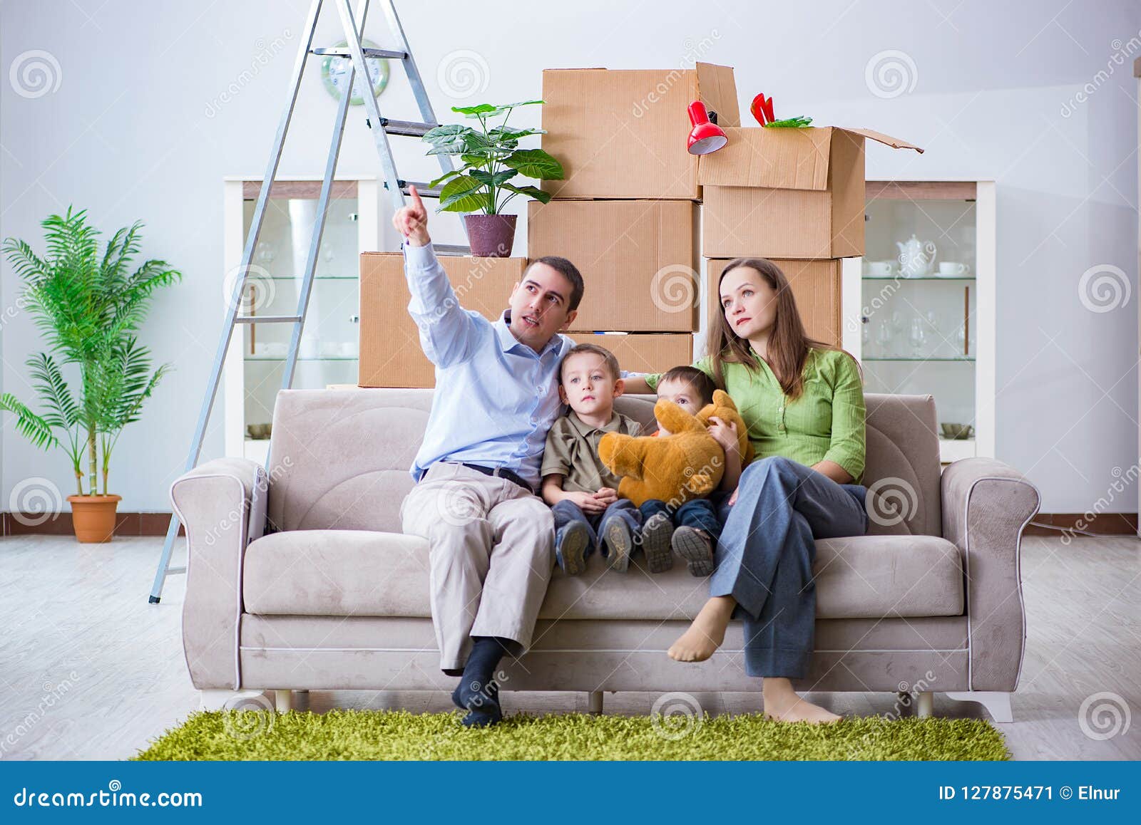 The Young Family Enjoying Time at Home Stock Image - Image of little ...