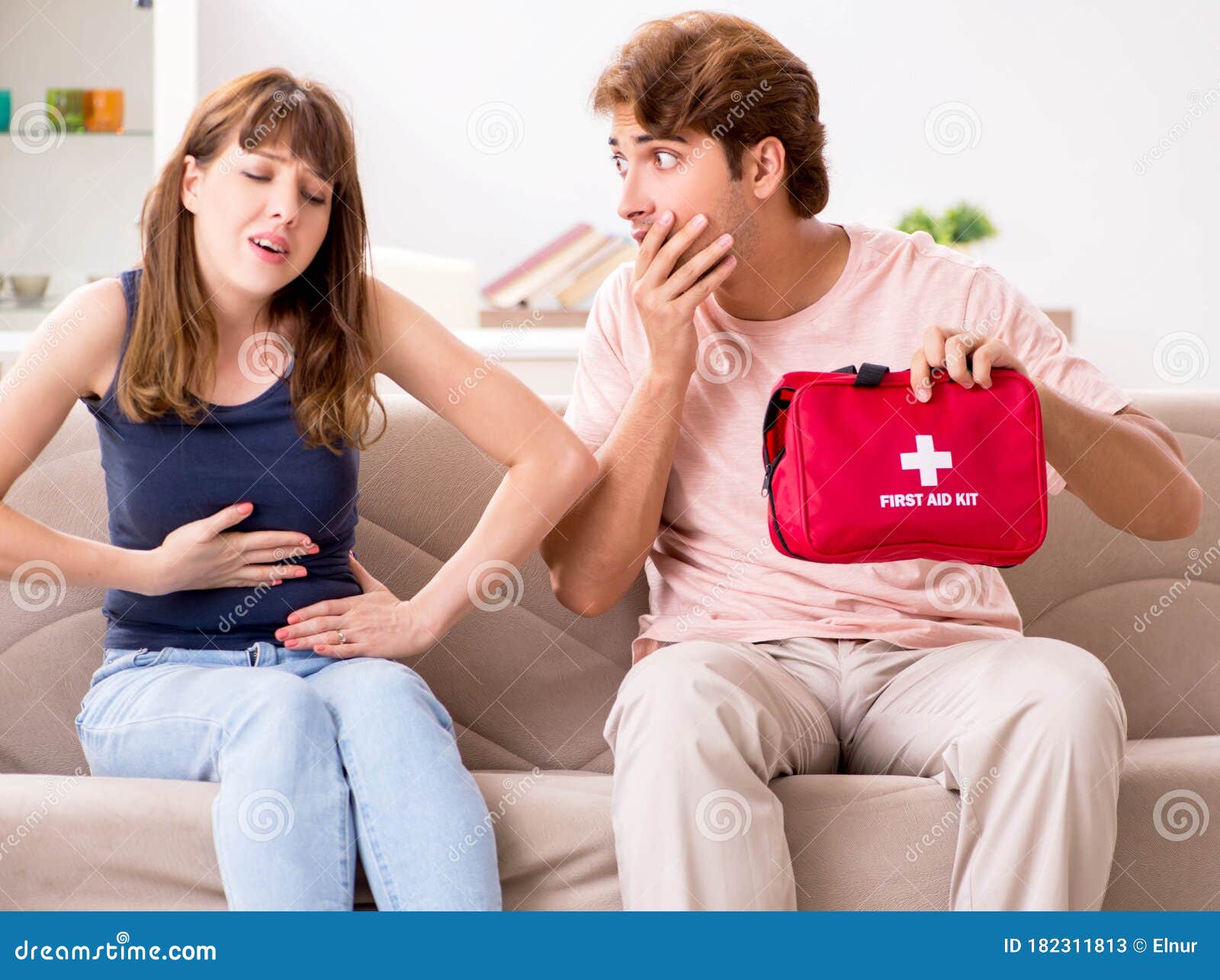 Young Family Getting Treatment with First Aid Kit Stock Image - Image ...
