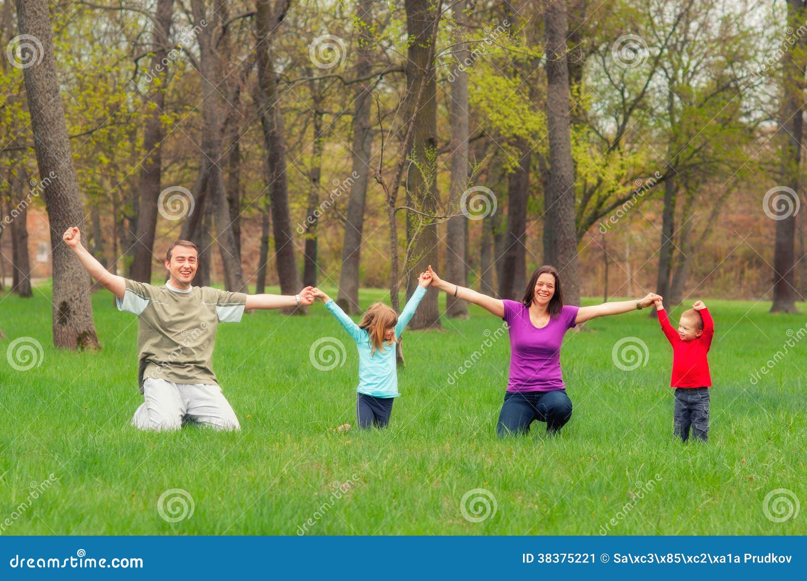 Young Family Having Fun in the Forest Stock Image - Image of daughter ...