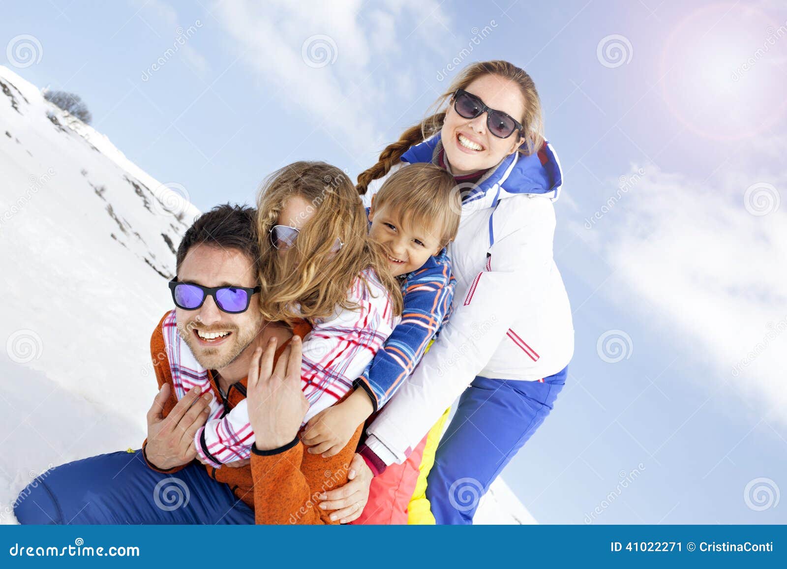 Young Family Having Fun in the Snow Stock Image - Image of group, snow ...