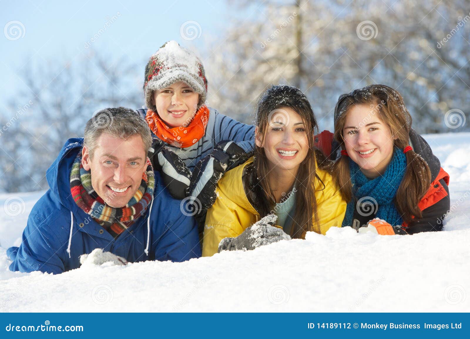 Young Family Having Fun in Snowy Landscape Stock Photo - Image of ...