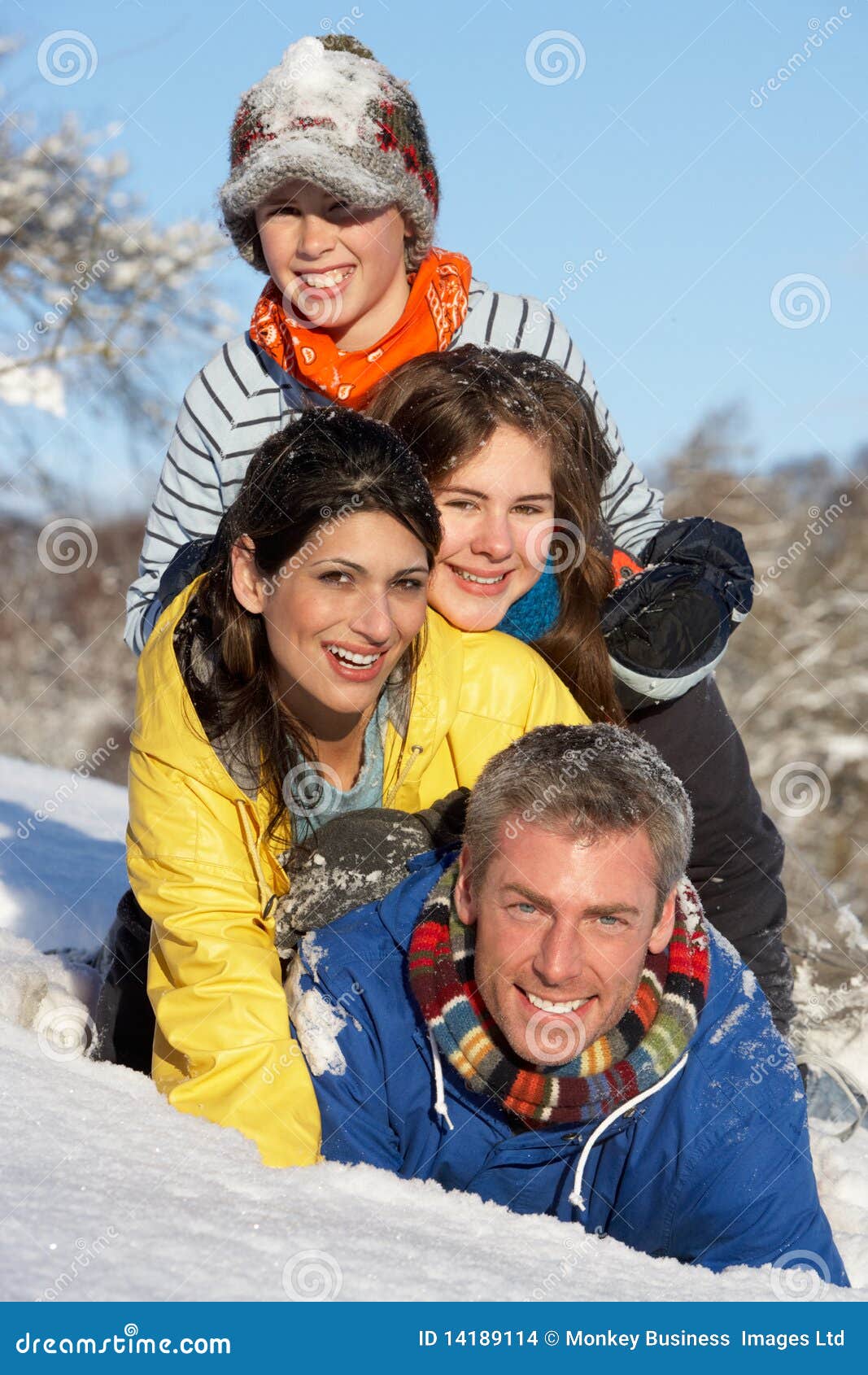Young Family Having Fun in Snowy Landscape Stock Photo - Image of ...