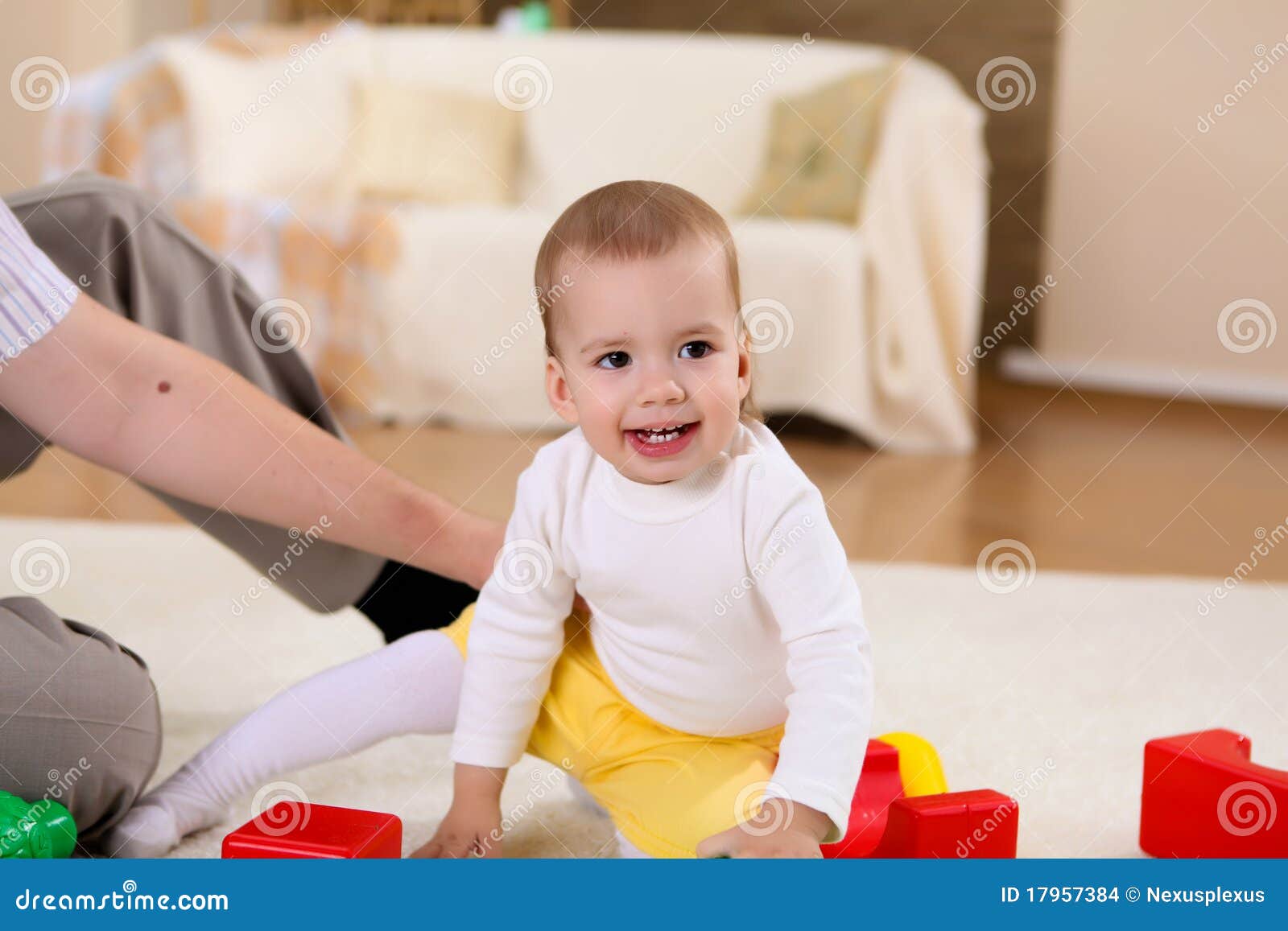Young Family at Home Playing with a Baby Stock Photo - Image of ...