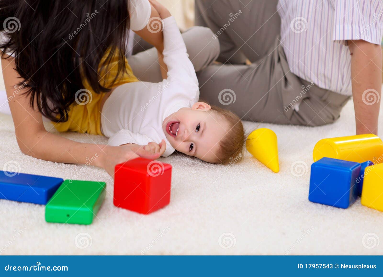Young Family at Home Playing with a Baby Stock Image - Image of ...