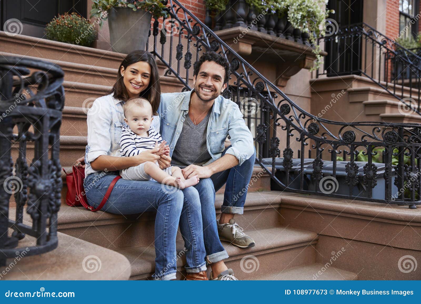 Young Family with Kids Sitting on Front Stoops Stock Image - Image of ...