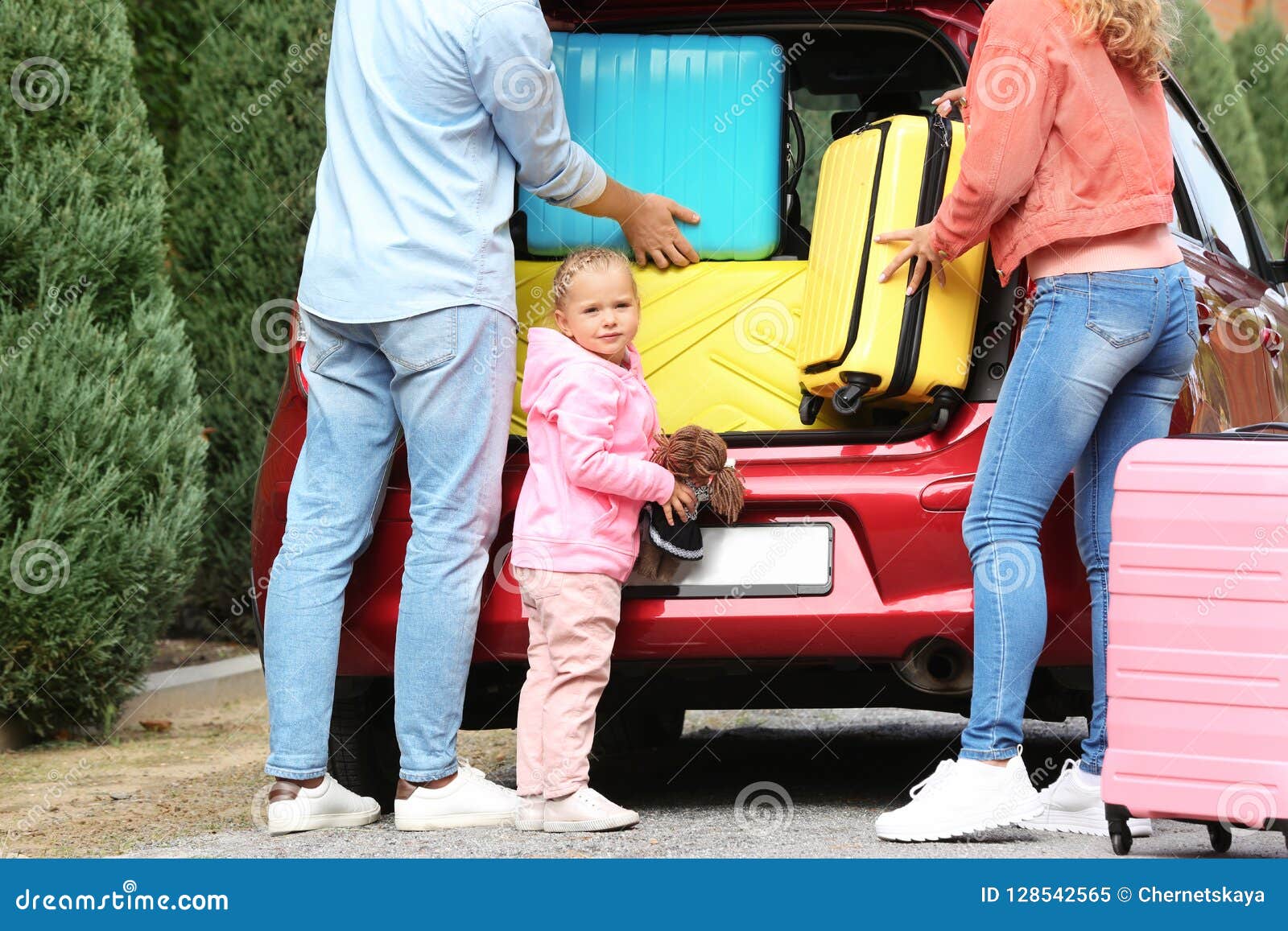 Young Family Loading Suitcases in Car Trunk Stock Image - Image of ...