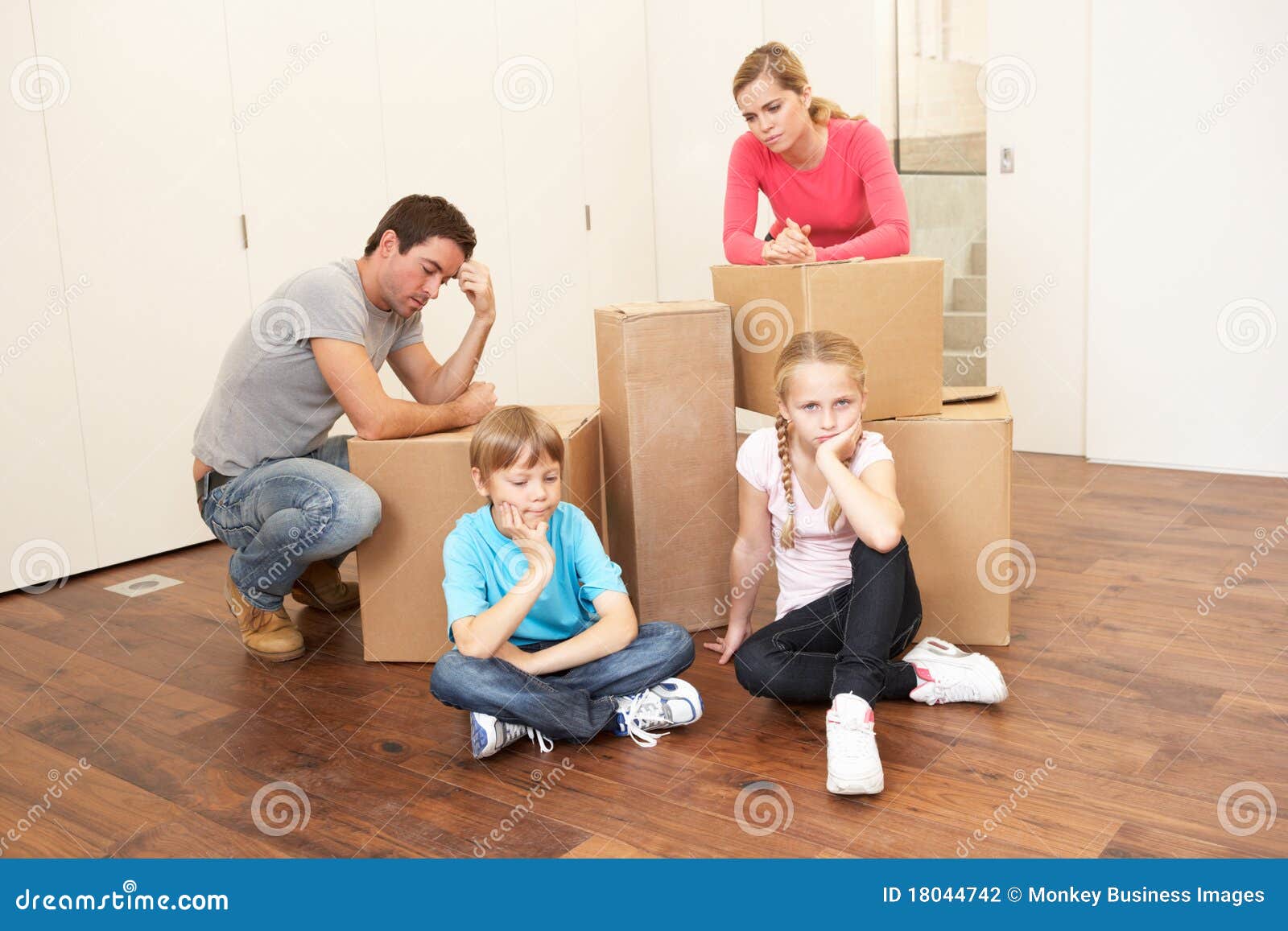 Young Family Looking Upset among Boxes Stock Photo - Image of indoors ...