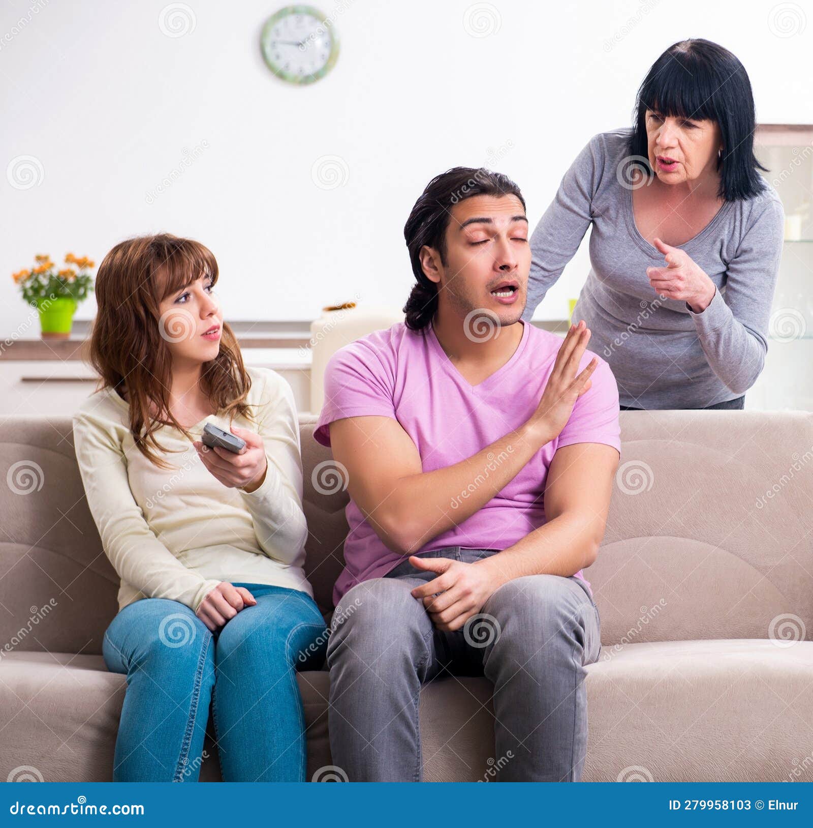 Young Family and Mother-in-law in Family Issues Concept Stock Image ...