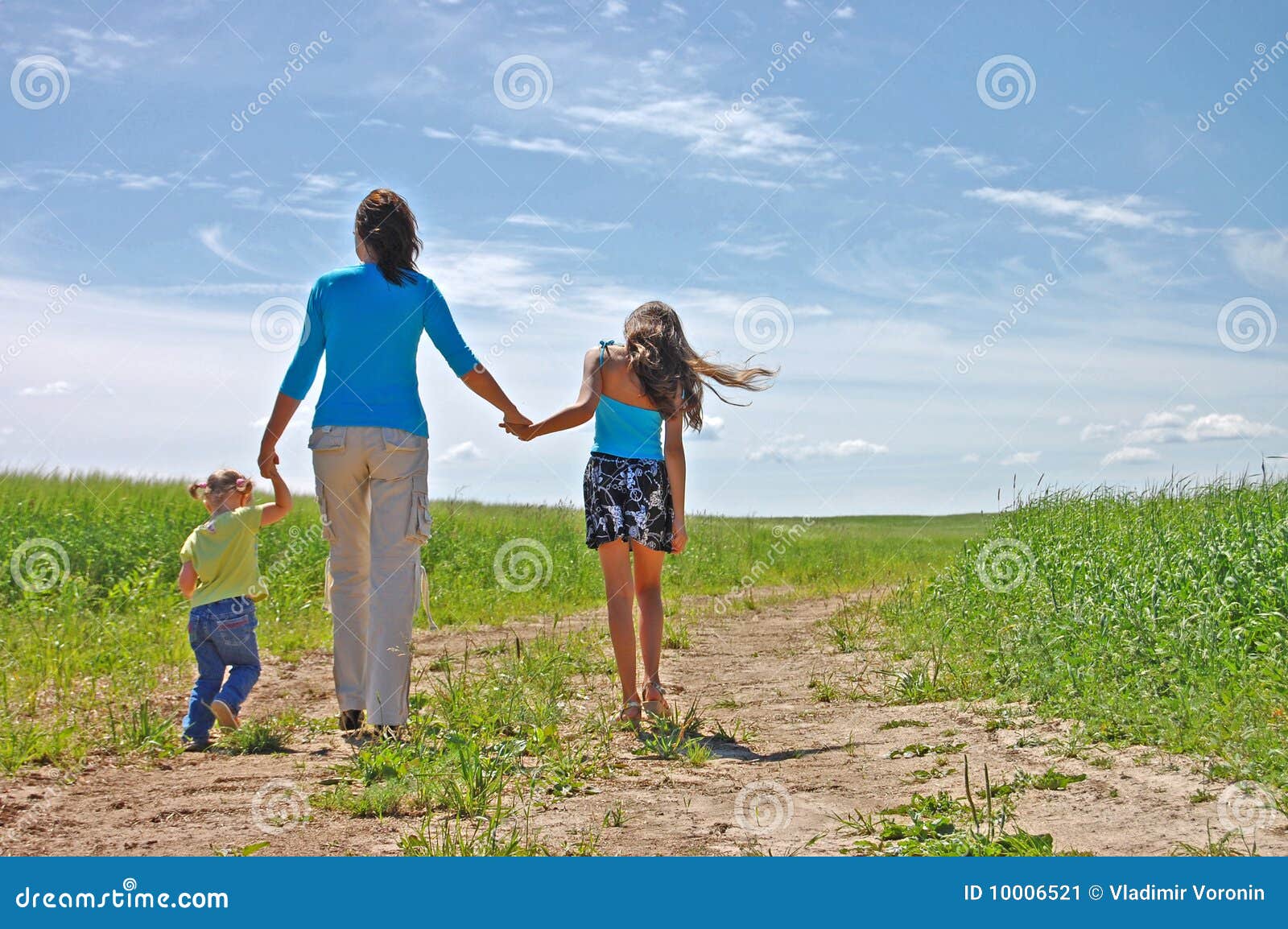 Young Family Running Over a Farmer Field Stock Image - Image of ...