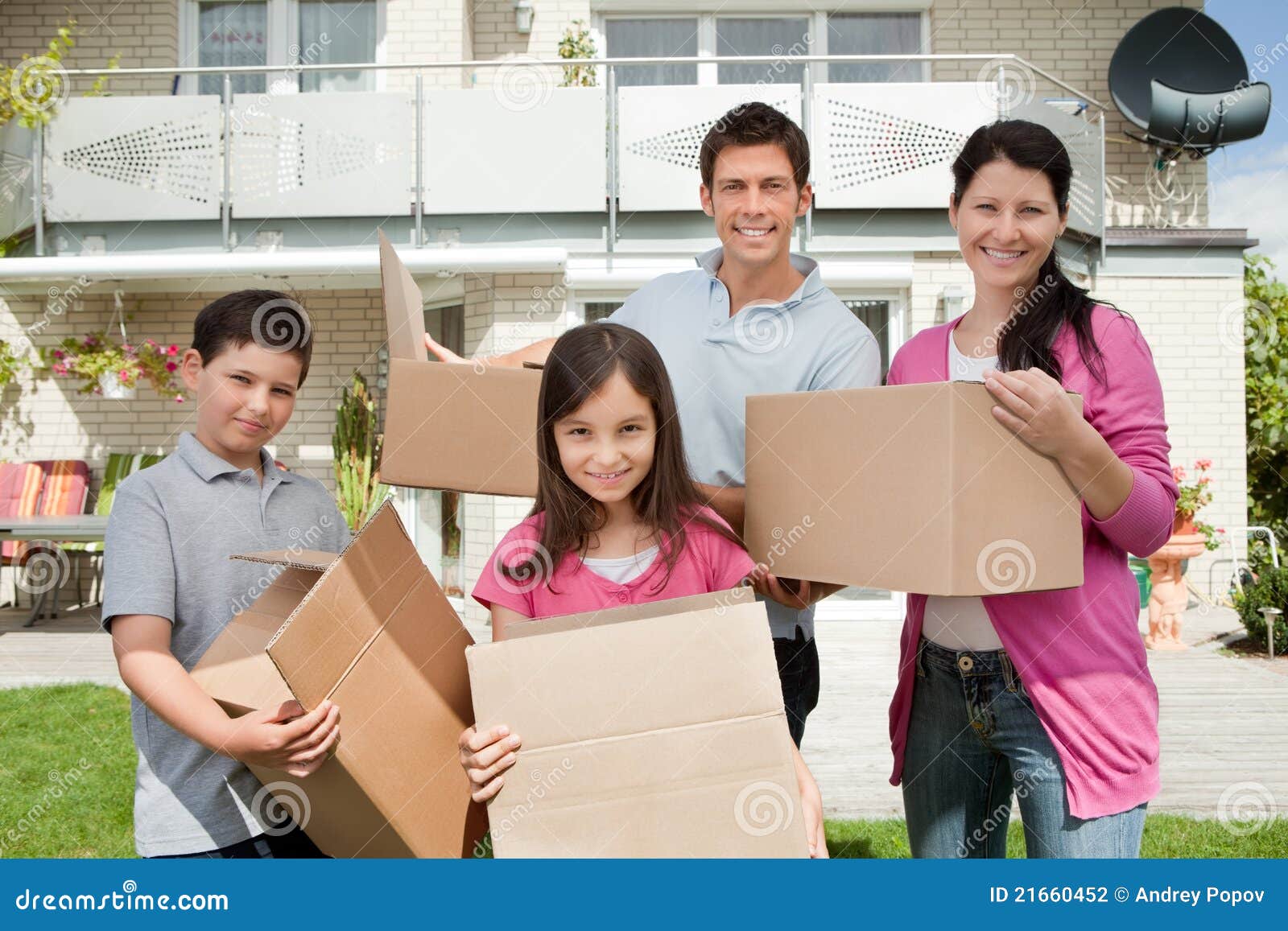 Young Family Shifting into New House Stock Photo - Image of outside ...