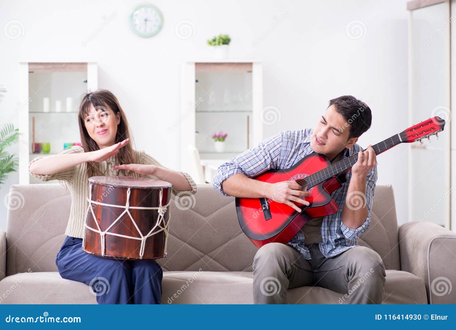 The Young Family Singing and Playing Music at Home Stock Photo - Image ...