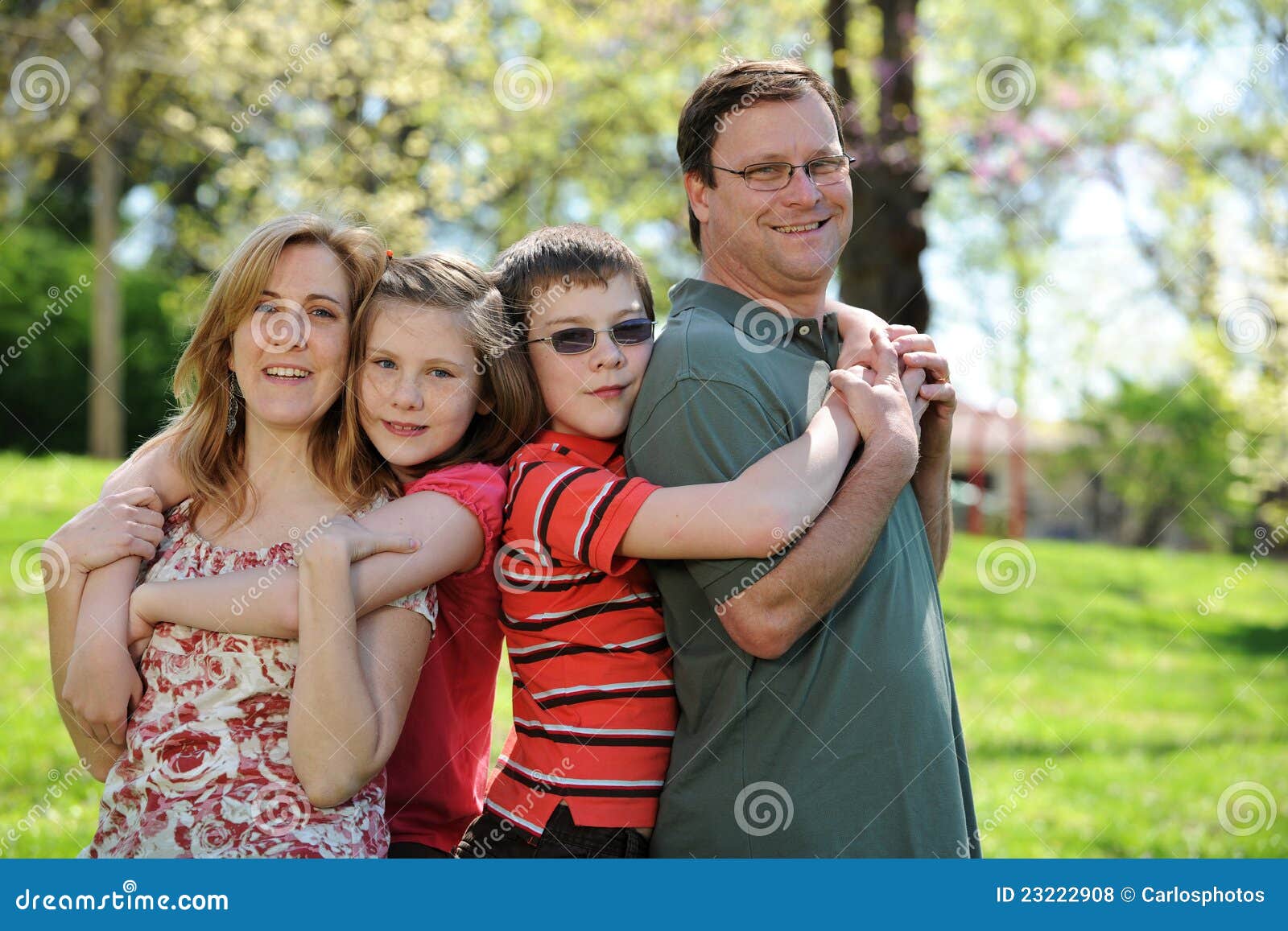Young Family with Son and Daughter Stock Photo - Image of field, family ...