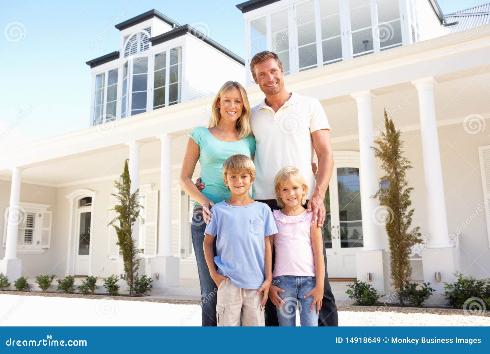 Young Family Standing Outside Dream Home Stock Image - Image of ...