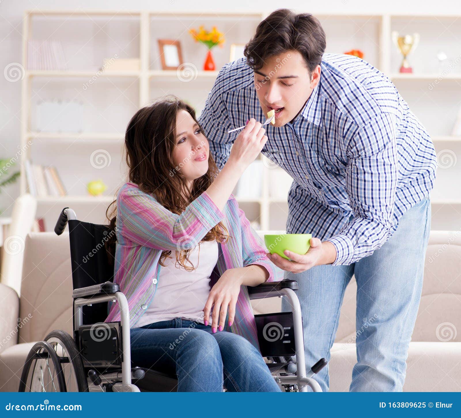 The Young Family Taking Care of Each Other Stock Image - Image of love ...