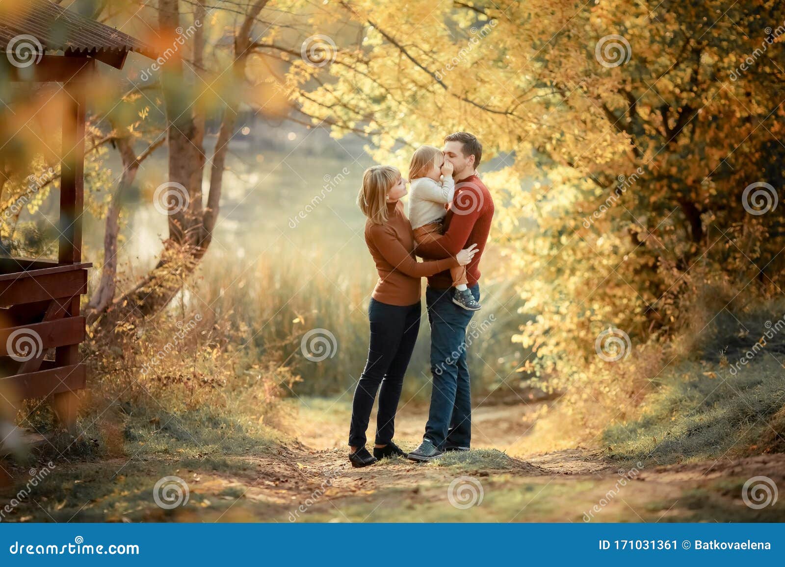 A Young Family of Three on a Spring Walk All Together Stock Image ...
