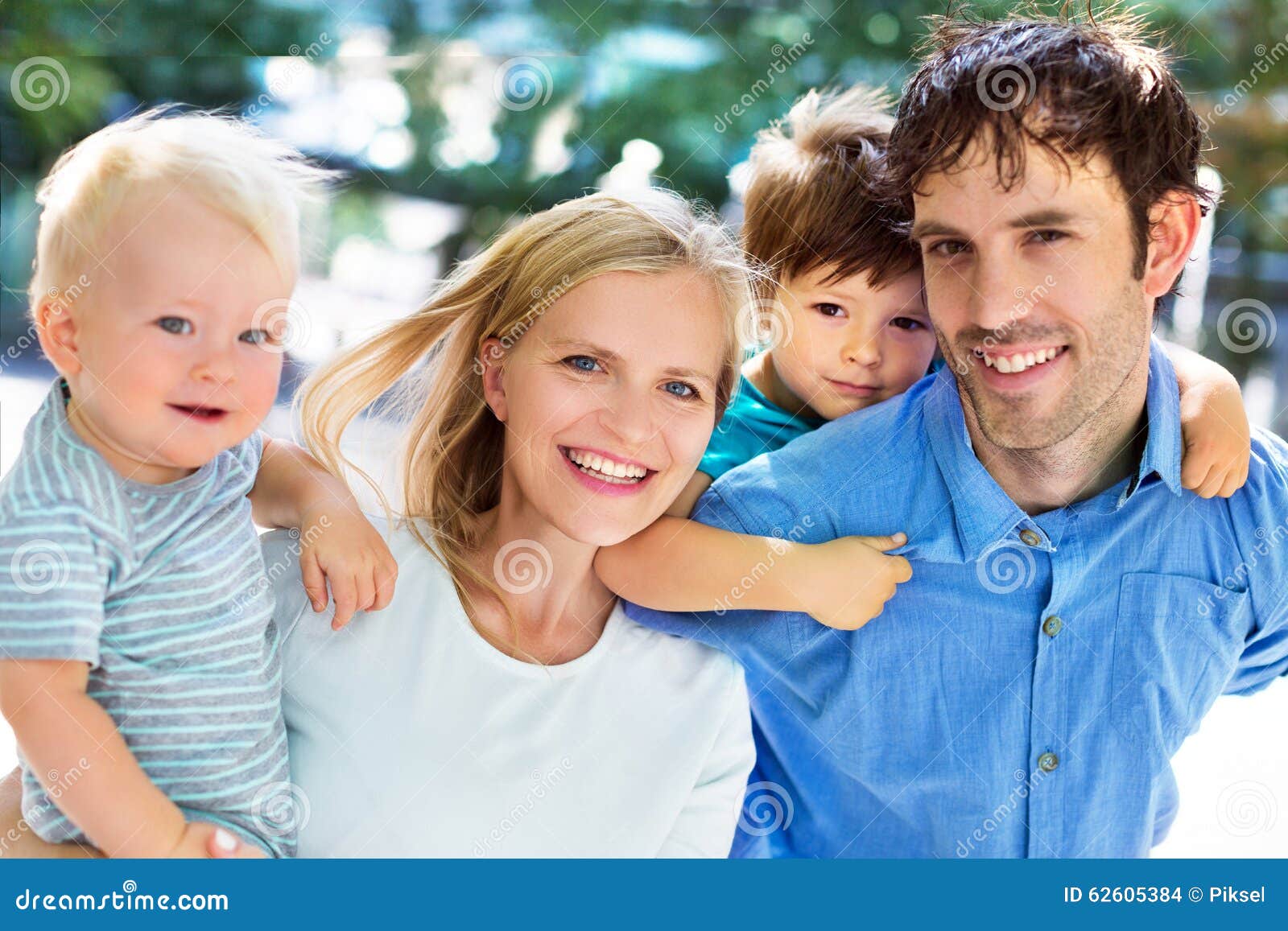 Young family with two kids stock photo. Image of caucasian - 62605384
