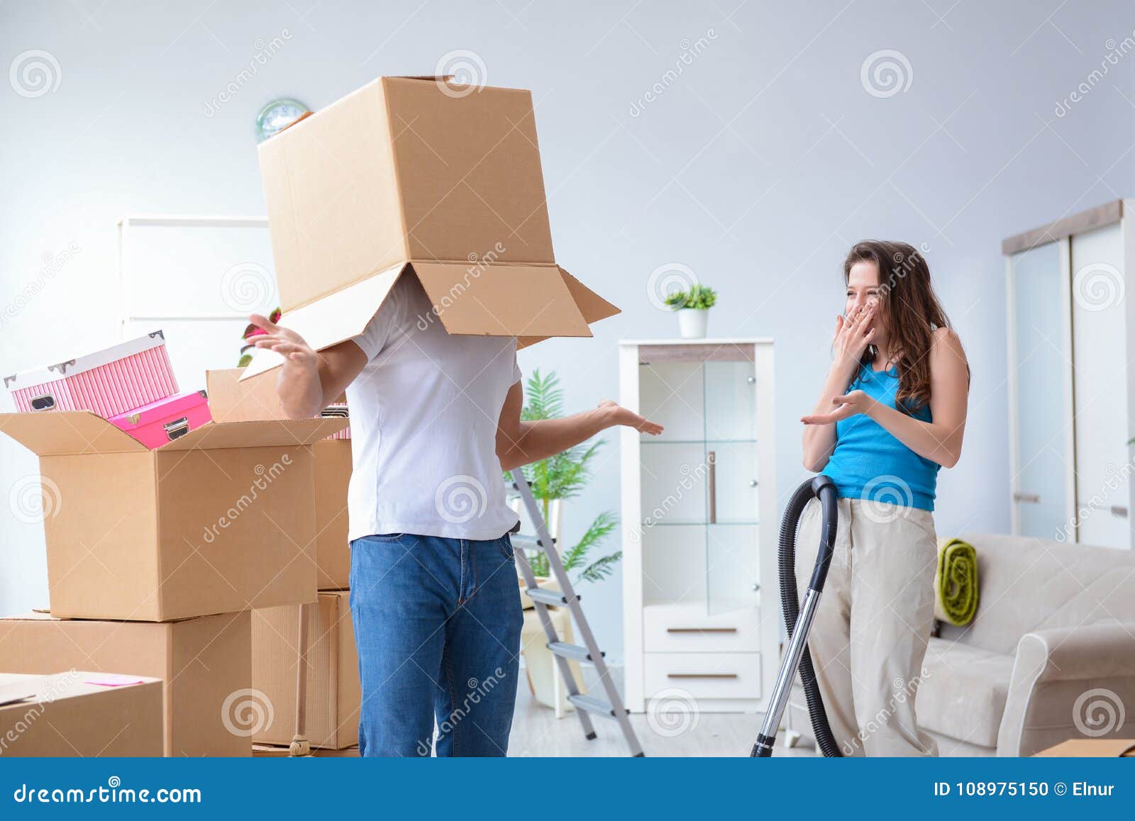 The Young Family Unpacking at New House with Boxes Stock Photo - Image ...