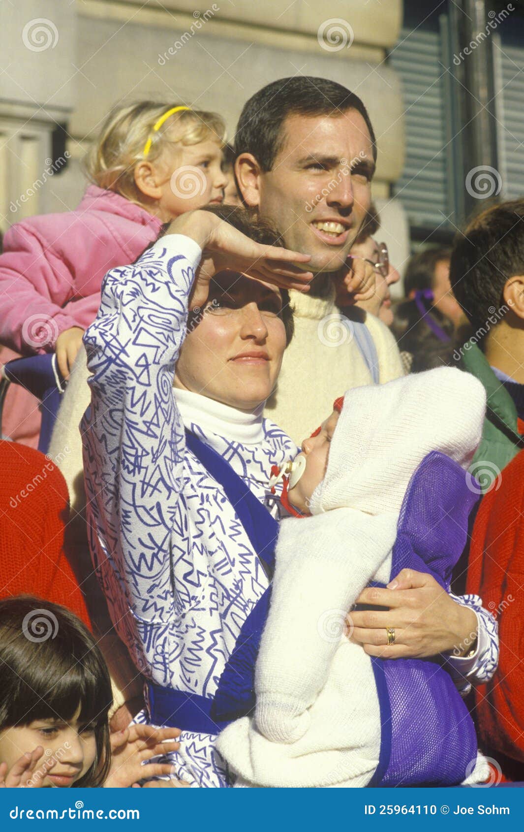 A Young Family Watching the Thanksgiving Parade Editorial Image - Image ...