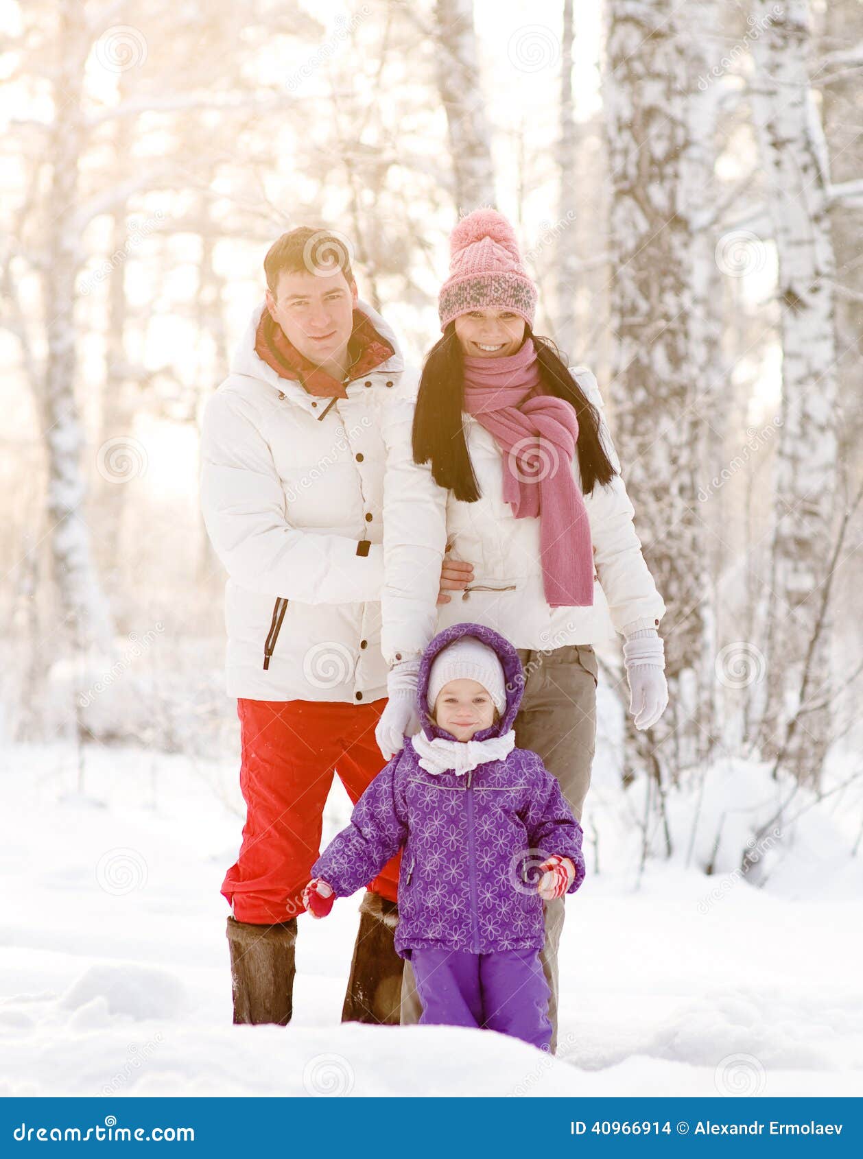 Young Family in Winter Forest Stock Photo - Image of person, happiness ...