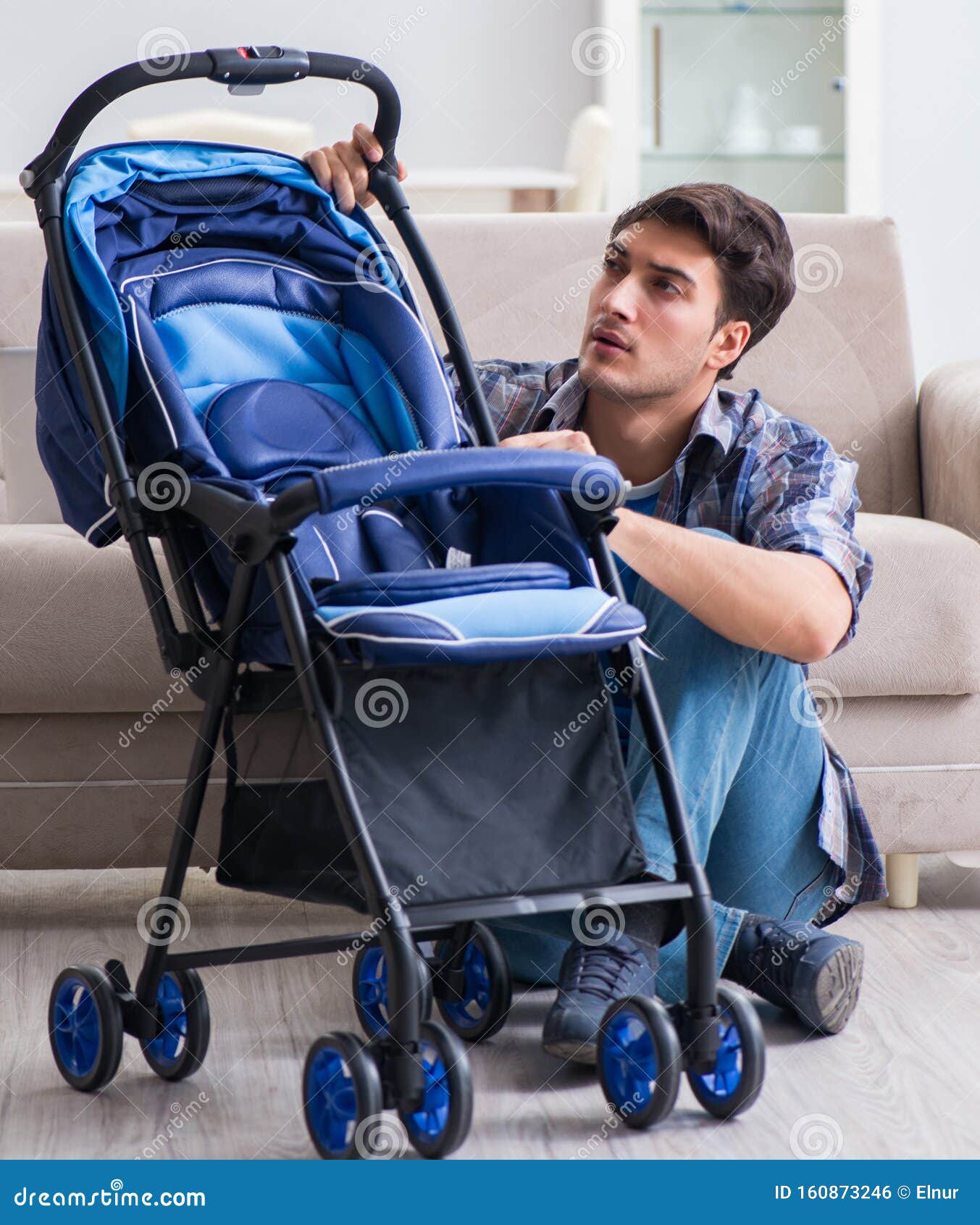 Young Father Assembling Baby Pram at Home Stock Photo - Image of ...