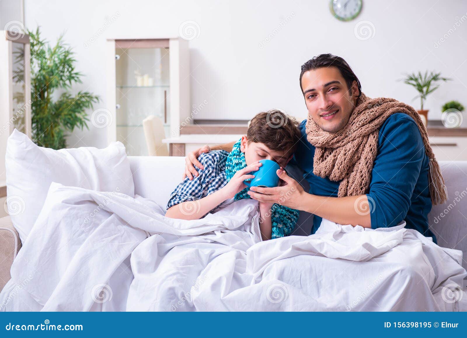 Young Father Caring for Sick Son Stock Image - Image of infection, cold ...